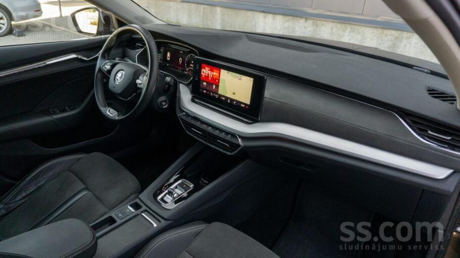 Brown Skoda Octavia 2020 in Riga, with an engine capacity of 2.00 L and mileage of 88 thousand km for 16190 €, photo 11 on AUTOMOTO.COM.LV
