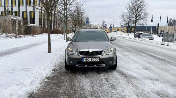 Brown Skoda Octavia 2009 in Riga, with an engine capacity of 1.80 L and mileage of 234 thousand km for 6200 €, photo 2 on AUTOMOTO.COM.LV