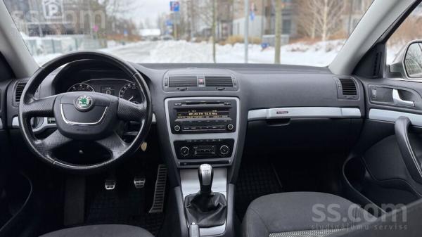 Brown Skoda Octavia 2009 in Riga, with an engine capacity of 1.80 L and mileage of 234 thousand km for 6200 €, photo 7 on AUTOMOTO.COM.LV