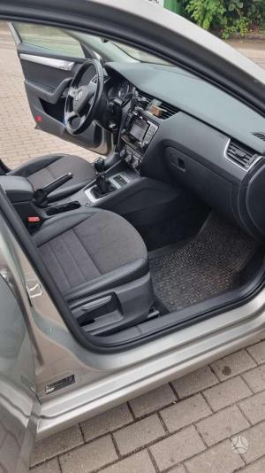 Brown Skoda Octavia 2014 in Kaunas, with an engine capacity of 1.60 L and mileage of 218 thousand km for 6300 €, photo 9 on AUTOMOTO.COM.LV