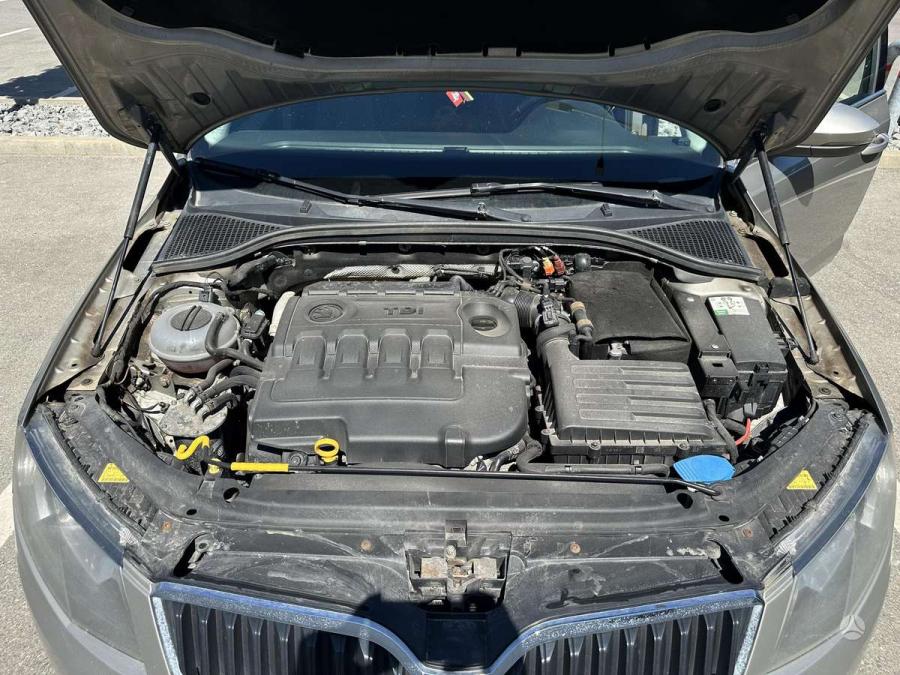 Brown Skoda Octavia 2015 in Vilnius, with an engine capacity of 1.60 L and mileage of 268 thousand km for 5699 €, photo 20 on AUTOMOTO.COM.LV