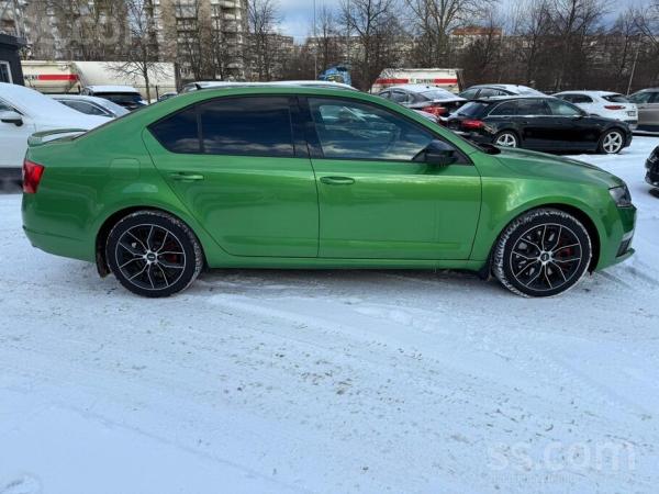 Green Skoda Octavia 2015 in Riga, with an engine capacity of 2.00 L and mileage of 220 thousand km for 11190 €, photo 4 on AUTOMOTO.COM.LV