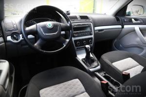 Green Skoda Octavia 2009 in Riga, with an engine capacity of 1.90 L and mileage of 173 thousand km for 2495 €, photo 10 on AUTOMOTO.COM.LV