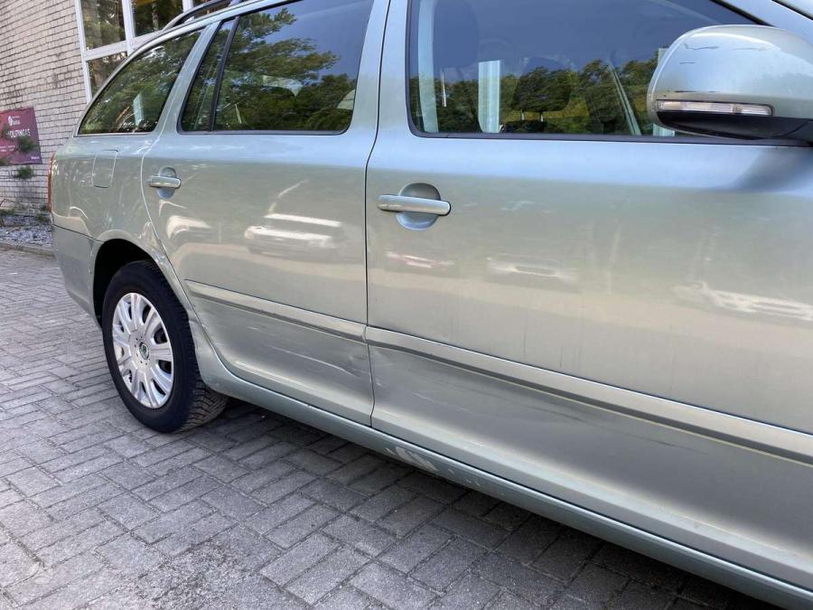 Green Skoda Octavia 2011 in Jonava, with an engine capacity of 1.20 L and mileage of 173 thousand km for 1500 €, photo 8 on AUTOMOTO.COM.LV