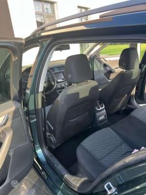 Green Skoda Octavia 2015 in Jonava, with an engine capacity of 1.97 L and mileage of 350 thousand km for 5850 €, photo 13 on AUTOMOTO.COM.LV