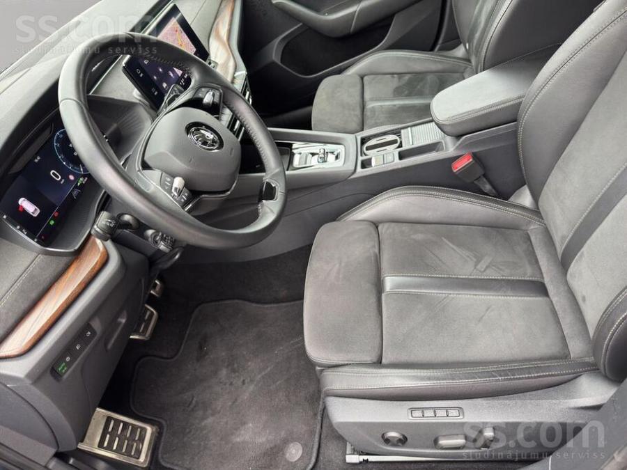 Green Skoda Octavia 2023 in Riga, with an engine capacity of 2.00 L and mileage of 67 thousand km for 26995 €, photo 13 on AUTOMOTO.COM.LV