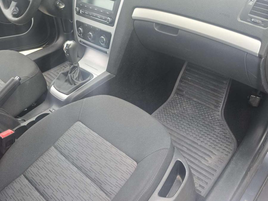 Grey Skoda Octavia 2010 in Panevezys, with an engine capacity of 1.60 L and mileage of 320 thousand km for 2699 €, photo 13 on AUTOMOTO.COM.LV