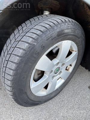 Pelēks Skoda Octavia 2010 Rīga, ar dzinēja tilpumu 1.80 L un nobraukumu 440 tūkst. km par 2250 €, foto 15 vietnē AUTOMOTO.COM.LV