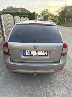 Grey Skoda Octavia 2011 in Riga, with an engine capacity of 2.00 L and mileage of 466 thousand km for 2200 €, photo  on AUTOMOTO.COM.LV
