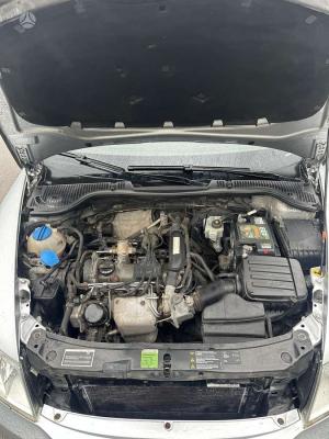 Grey Skoda Octavia 2011 in Kelme, with an engine capacity of 1.20 L and mileage of 220 thousand km for 2100 €, photo 12 on AUTOMOTO.COM.LV