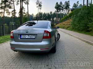 Grey Skoda Octavia 2012 in Riga, with an engine capacity of 1.80 L and mileage of 180 thousand km for 3990 €, photo 5 on AUTOMOTO.COM.LV