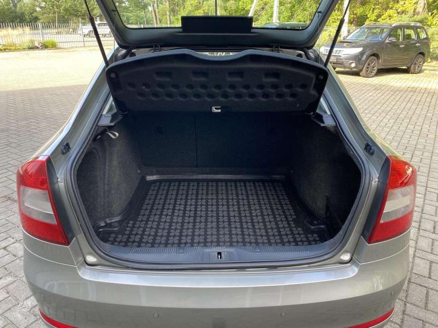Grey Skoda Octavia 2012 in Jonava, with an engine capacity of 1.20 L and mileage of 215 thousand km for 3100 €, photo 7 on AUTOMOTO.COM.LV