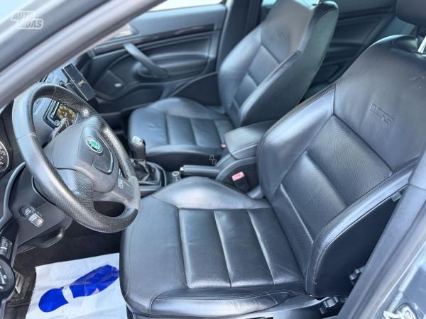 Grey Skoda Octavia 2012 in Kretinga, with an engine capacity of 2.00 L and mileage of 296 thousand km for 5600 €, photo 7 on AUTOMOTO.COM.LV