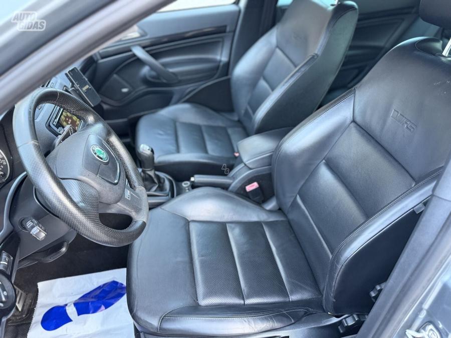 Grey Skoda Octavia 2012 in Kretinga, with an engine capacity of 2.00 L and mileage of 296 thousand km for 5600 €, photo 7 on AUTOMOTO.COM.LV