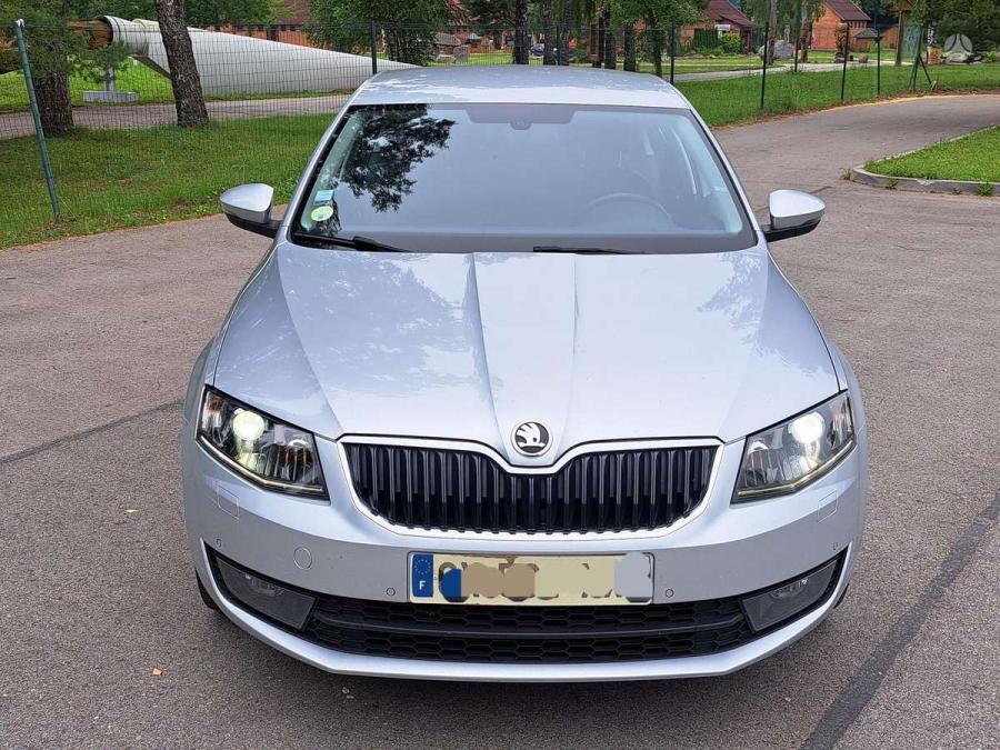 Grey Skoda Octavia 2013 in Taurage, with an engine capacity of 1.97 L and mileage of 215 thousand km for 6999 €, photo 4 on AUTOMOTO.COM.LV
