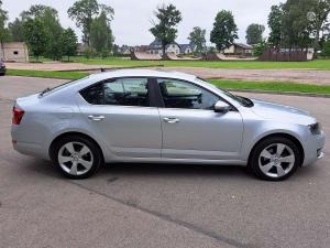 Grey Skoda Octavia 2013 in Taurage, with an engine capacity of 1.97 L and mileage of 215 thousand km for 6999 €, photo 5 on AUTOMOTO.COM.LV