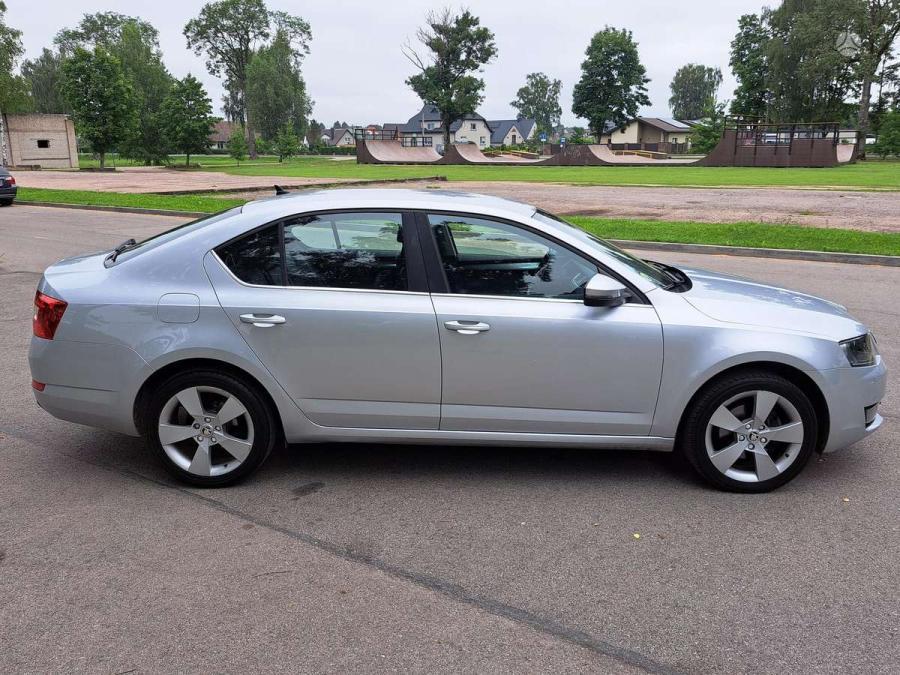 Grey Skoda Octavia 2013 in Taurage, with an engine capacity of 1.97 L and mileage of 215 thousand km for 6999 €, photo 5 on AUTOMOTO.COM.LV
