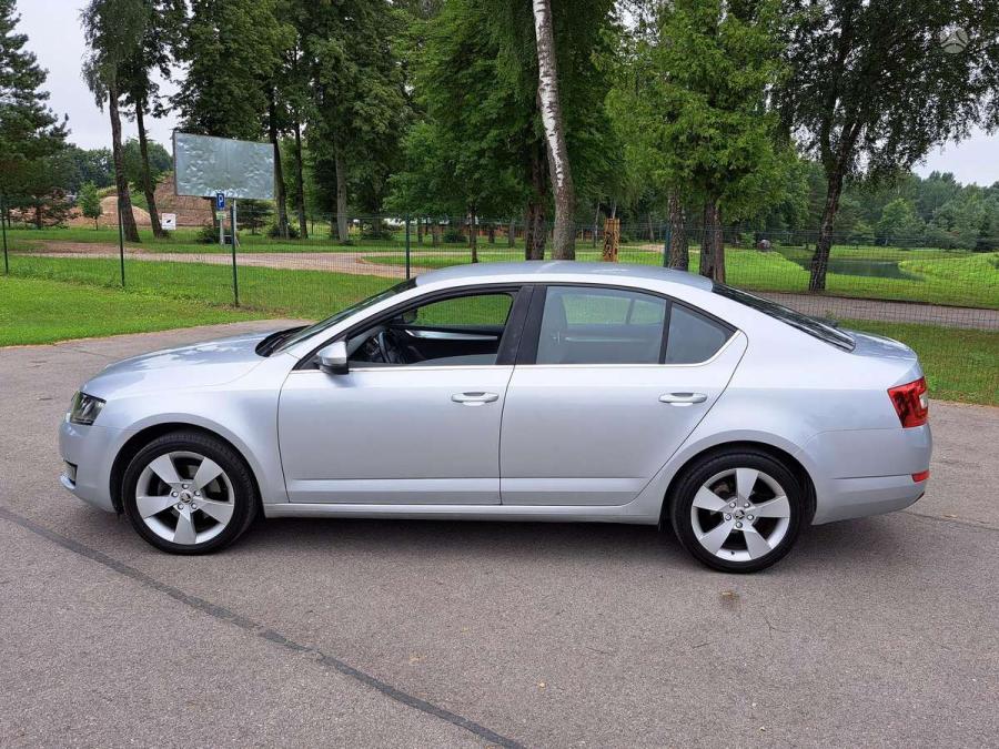 Grey Skoda Octavia 2013 in Taurage, with an engine capacity of 1.97 L and mileage of 215 thousand km for 6999 €, photo 6 on AUTOMOTO.COM.LV