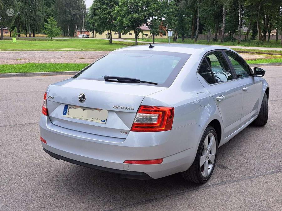 Grey Skoda Octavia 2013 in Taurage, with an engine capacity of 1.97 L and mileage of 215 thousand km for 6999 €, photo 7 on AUTOMOTO.COM.LV
