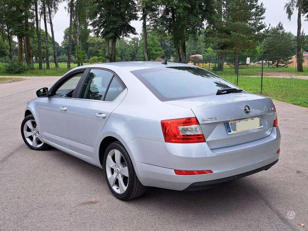 Grey Skoda Octavia 2013 in Taurage, with an engine capacity of 1.97 L and mileage of 215 thousand km for 6999 €, photo 7 on AUTOMOTO.COM.LV