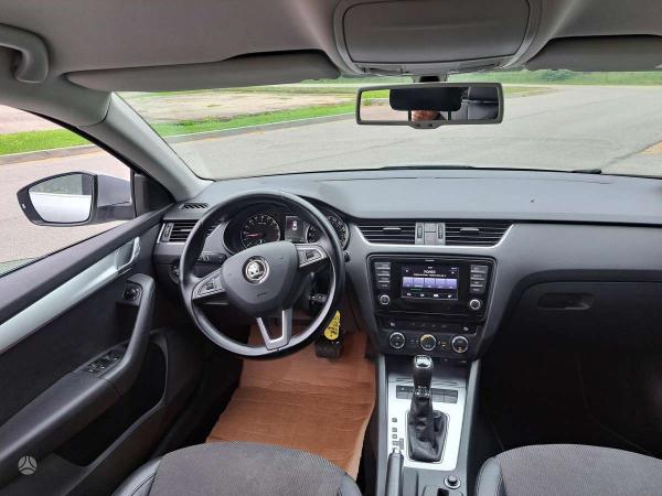 Grey Skoda Octavia 2013 in Taurage, with an engine capacity of 1.97 L and mileage of 215 thousand km for 6999 €, photo 8 on AUTOMOTO.COM.LV