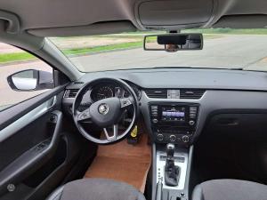Grey Skoda Octavia 2013 in Taurage, with an engine capacity of 1.97 L and mileage of 215 thousand km for 6999 €, photo 9 on AUTOMOTO.COM.LV