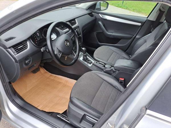 Grey Skoda Octavia 2013 in Taurage, with an engine capacity of 1.97 L and mileage of 215 thousand km for 6999 €, photo 9 on AUTOMOTO.COM.LV