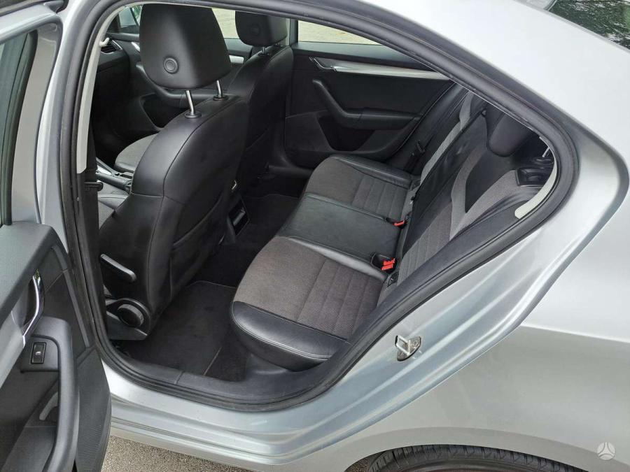 Grey Skoda Octavia 2013 in Taurage, with an engine capacity of 1.97 L and mileage of 215 thousand km for 6999 €, photo 15 on AUTOMOTO.COM.LV