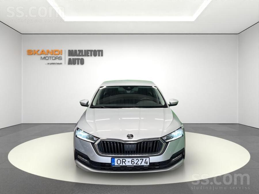 Grey Skoda Octavia 2022 in Riga, with an engine capacity of 2.00 L and mileage of 124 thousand km for 17990 €, photo 3 on AUTOMOTO.COM.LV