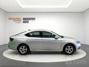 Grey Skoda Octavia 2022 in Riga, with an engine capacity of 2.00 L and mileage of 124 thousand km for 17990 €, photo 8 on AUTOMOTO.COM.LV
