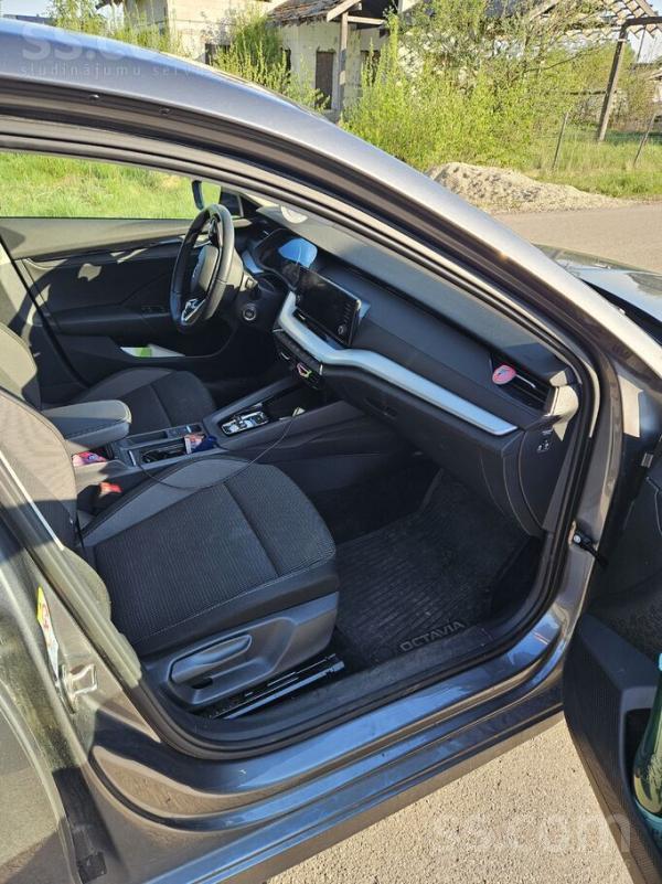 Grey Skoda Octavia 2023 in Riga, with an engine capacity of 2.00 L and mileage of 72 thousand km for 19900 €, photo 7 on AUTOMOTO.COM.LV