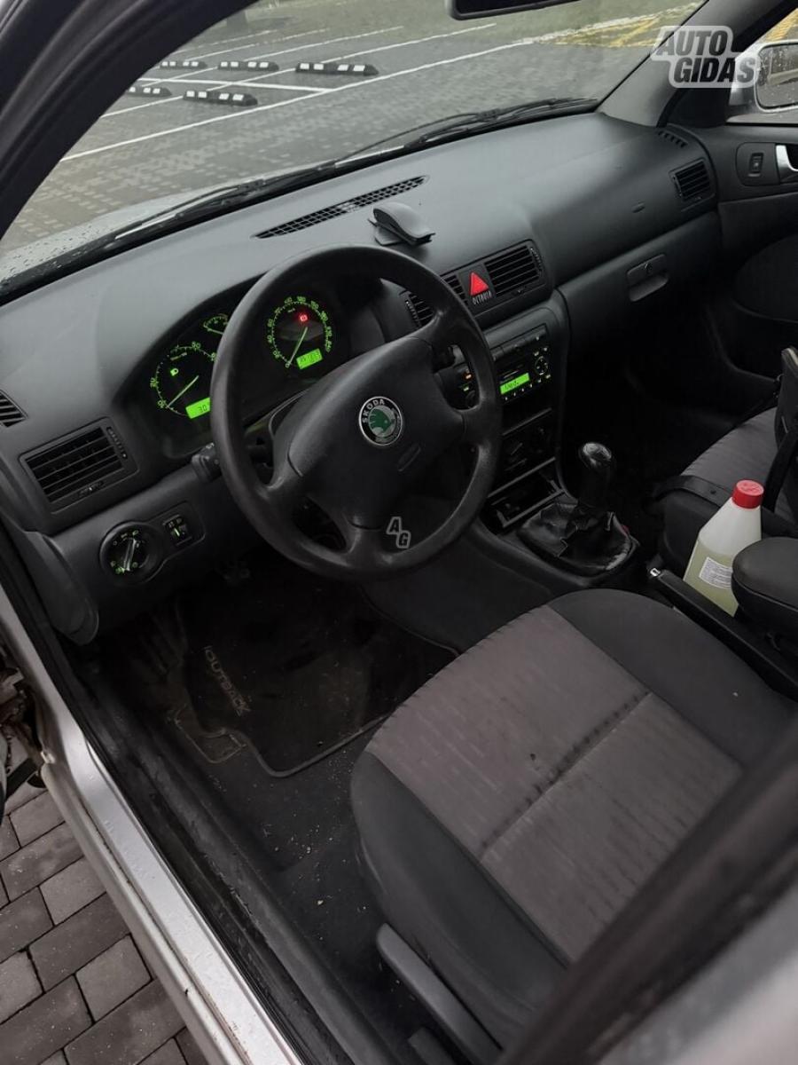 Pelēks Skoda Octavia 2002 Kauņa, ar dzinēja tilpumu 2.00 L un nobraukumu 285 tūkst. km par 799 €, foto 14 vietnē AUTOMOTO.COM.LV