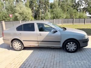 Grey Skoda Octavia 2008 in Riga, with an engine capacity of 1.90 L and mileage of 248 thousand km for 1100 €, photo 4 on AUTOMOTO.COM.LV