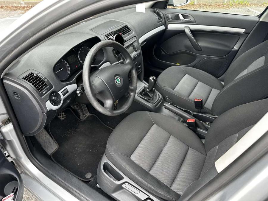Grey Skoda Octavia 2008 in Klaipeda, with an engine capacity of 1.90 L and mileage of 246 thousand km for 1800 €, photo 20 on AUTOMOTO.COM.LV