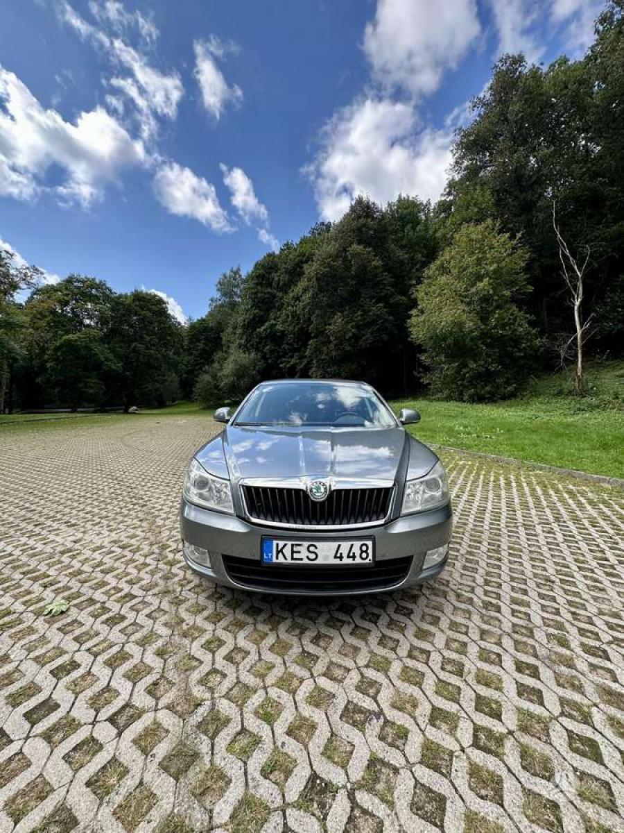 Grey Skoda Octavia 2012 in Vilnius, with an engine capacity of 1.97 L and mileage of 292 thousand km for 3490 €, photo 4 on AUTOMOTO.COM.LV