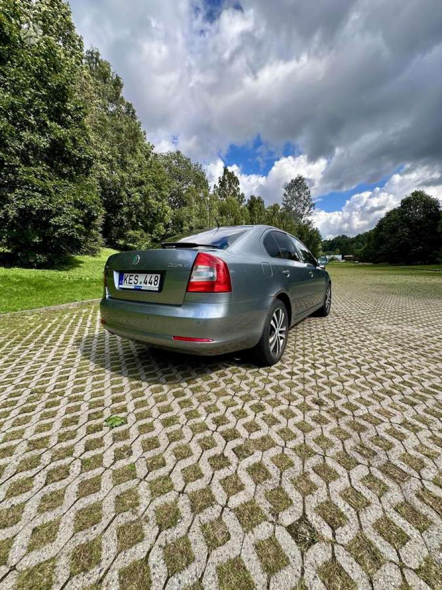 Grey Skoda Octavia 2012 in Vilnius, with an engine capacity of 1.97 L and mileage of 292 thousand km for 3490 €, photo 6 on AUTOMOTO.COM.LV