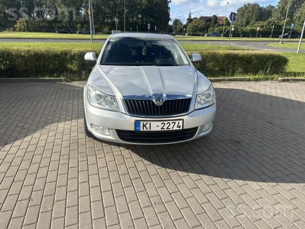 Grey Skoda Octavia 2012 in Riga, with an engine capacity of 2.00 L and mileage of 407 thousand km for 4100 €, photo 1 on AUTOMOTO.COM.LV