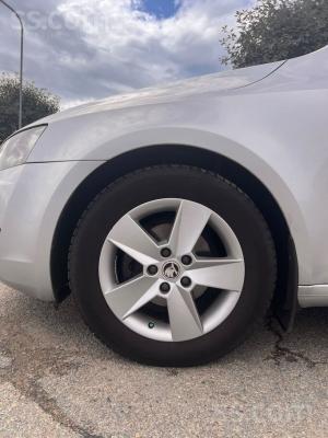 Grey Skoda Octavia 2014 in Riga, with an engine capacity of 1.60 L and mileage of 217 thousand km for 5650 €, photo 13 on AUTOMOTO.COM.LV