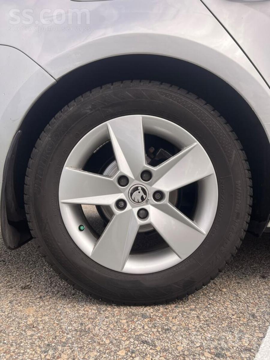 Grey Skoda Octavia 2014 in Riga, with an engine capacity of 1.60 L and mileage of 217 thousand km for 5650 €, photo 16 on AUTOMOTO.COM.LV