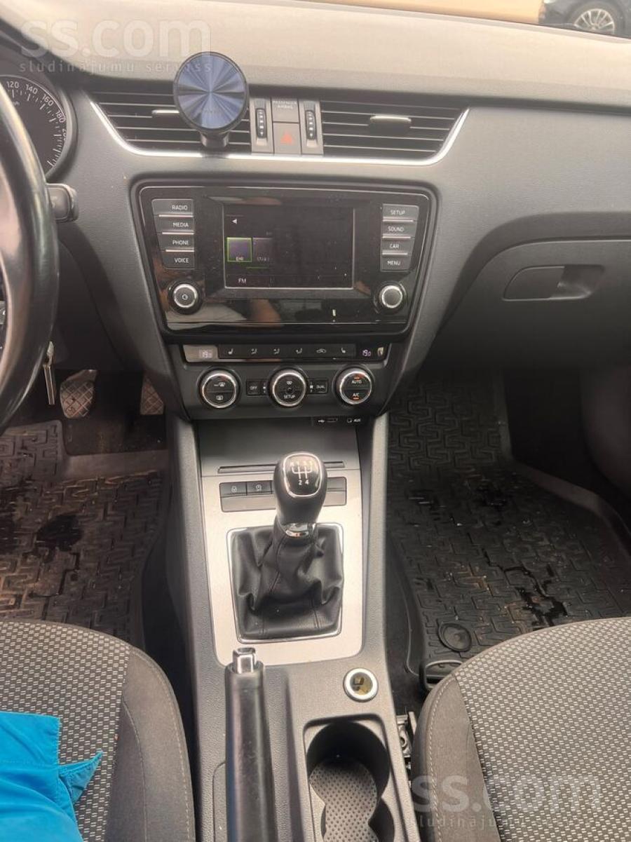 Grey Skoda Octavia 2014 in Riga, with an engine capacity of 1.60 L and mileage of 217 thousand km for 5650 €, photo 36 on AUTOMOTO.COM.LV