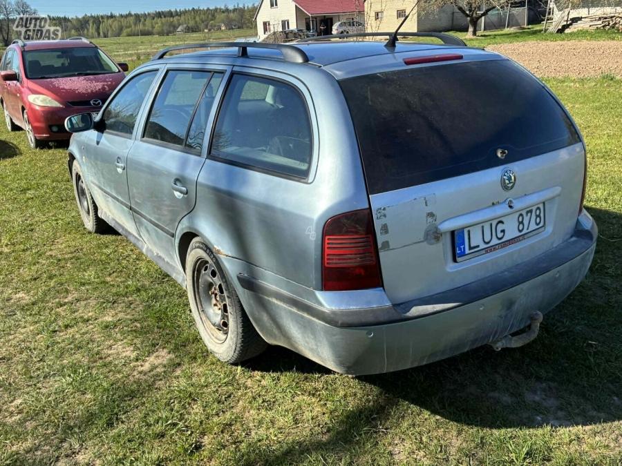 Pelēks Skoda Octavia 2004 Viļņa, ar dzinēja tilpumu 1.40 L un nobraukumu 300 tūkst. km par 350 €, foto 5 vietnē AUTOMOTO.COM.LV