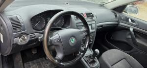 Pelēks Skoda Octavia 2005 Valmiera, ar dzinēja tilpumu 2.00 L un nobraukumu 251 tūkst. km par 1500 €, foto 9 vietnē AUTOMOTO.COM.LV