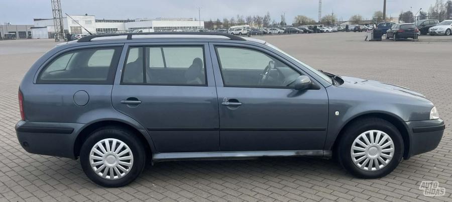 Grey Skoda Octavia 2006 in Marijampole, with an engine capacity of 1.60 L and mileage of 234 thousand km for 1649 €, photo 4 on AUTOMOTO.COM.LV
