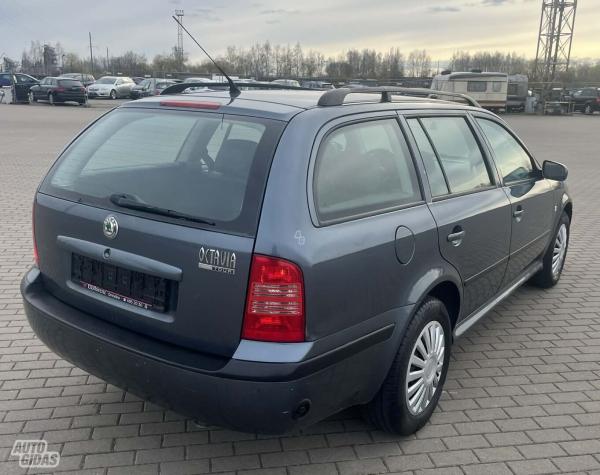 Grey Skoda Octavia 2006 in Marijampole, with an engine capacity of 1.60 L and mileage of 234 thousand km for 1649 €, photo 4 on AUTOMOTO.COM.LV