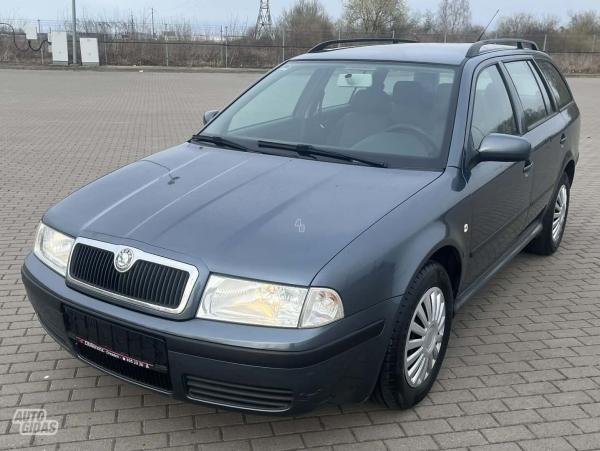 Grey Skoda Octavia 2006 in Marijampole, with an engine capacity of 1.60 L and mileage of 234 thousand km for 1649 €, photo 8 on AUTOMOTO.COM.LV