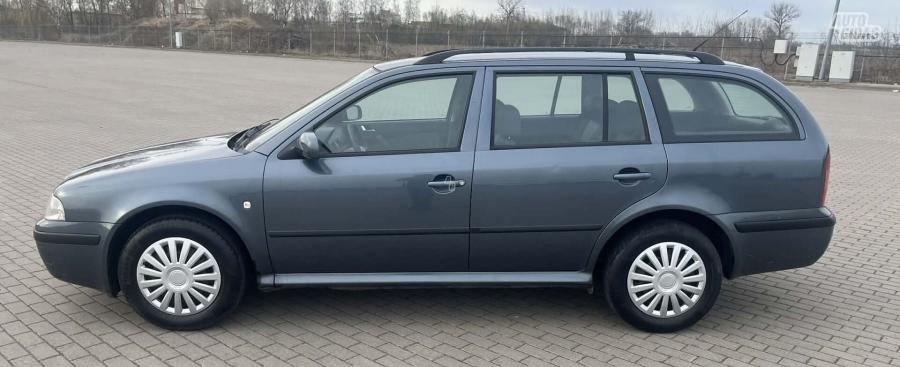 Grey Skoda Octavia 2006 in Marijampole, with an engine capacity of 1.60 L and mileage of 234 thousand km for 1649 €, photo 10 on AUTOMOTO.COM.LV