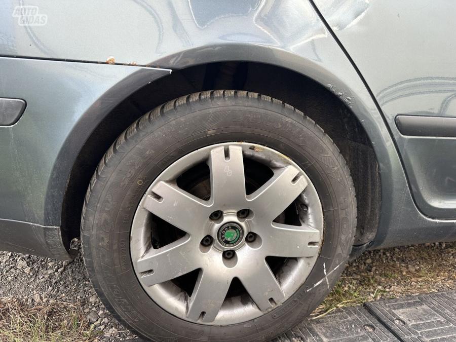 Grey Skoda Octavia 2006 in Vilnius, with an engine capacity of 2.00 L and mileage of 254 thousand km for 599 €, photo 11 on AUTOMOTO.COM.LV