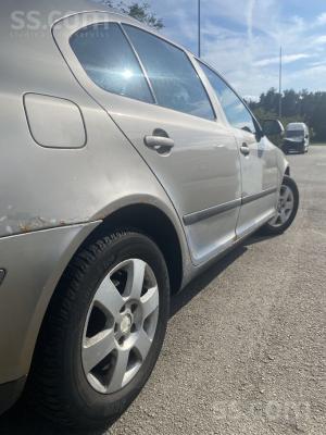 Grey Skoda Octavia 2007 in Riga, with an engine capacity of 2.00 L and mileage of 350 thousand km for 1000 €, photo 8 on AUTOMOTO.COM.LV