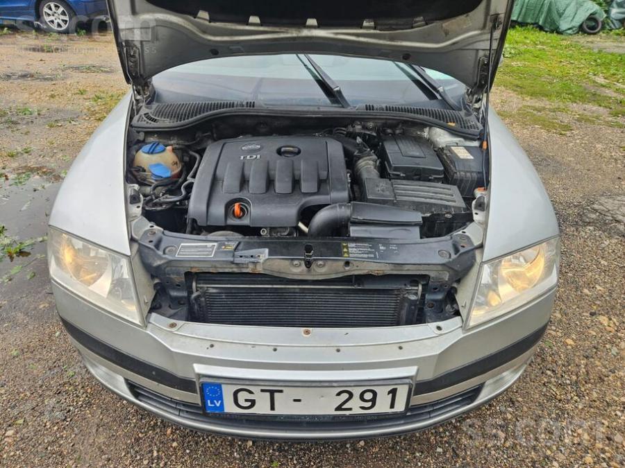 Grey Skoda Octavia 2007 in Riga, with an engine capacity of 2.00 L and mileage of 337 thousand km for 1680 €, photo 12 on AUTOMOTO.COM.LV