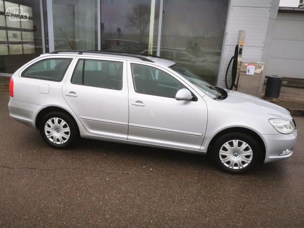 Grey Skoda Octavia 2009 in Klaipeda, with an engine capacity of 1.90 L and mileage of 217 thousand km for 3690 €, photo 8 on AUTOMOTO.COM.LV